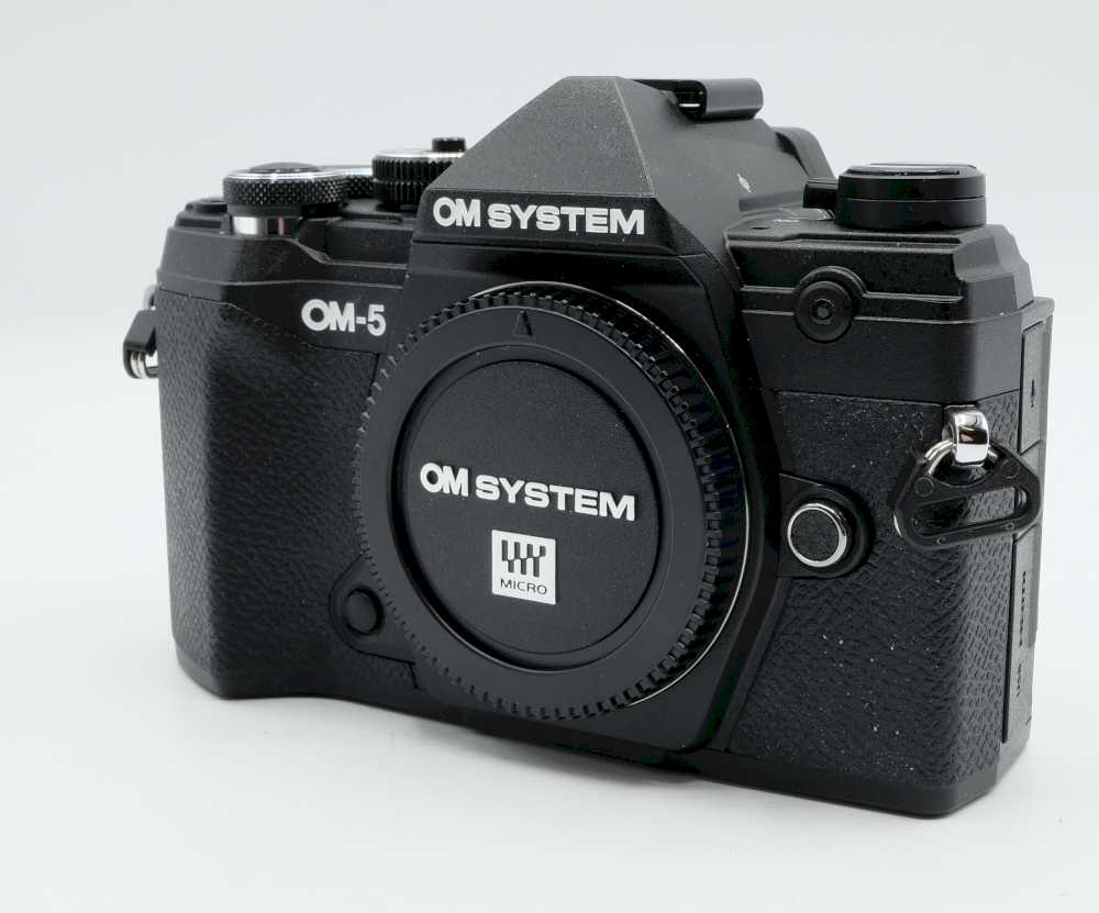 Occasion camera's: OM SYSTEM OM-5 Body + grip + remote OCCASION (166)